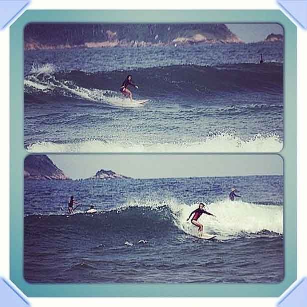 Daniele Suzuki surfa na Praia da Macumba